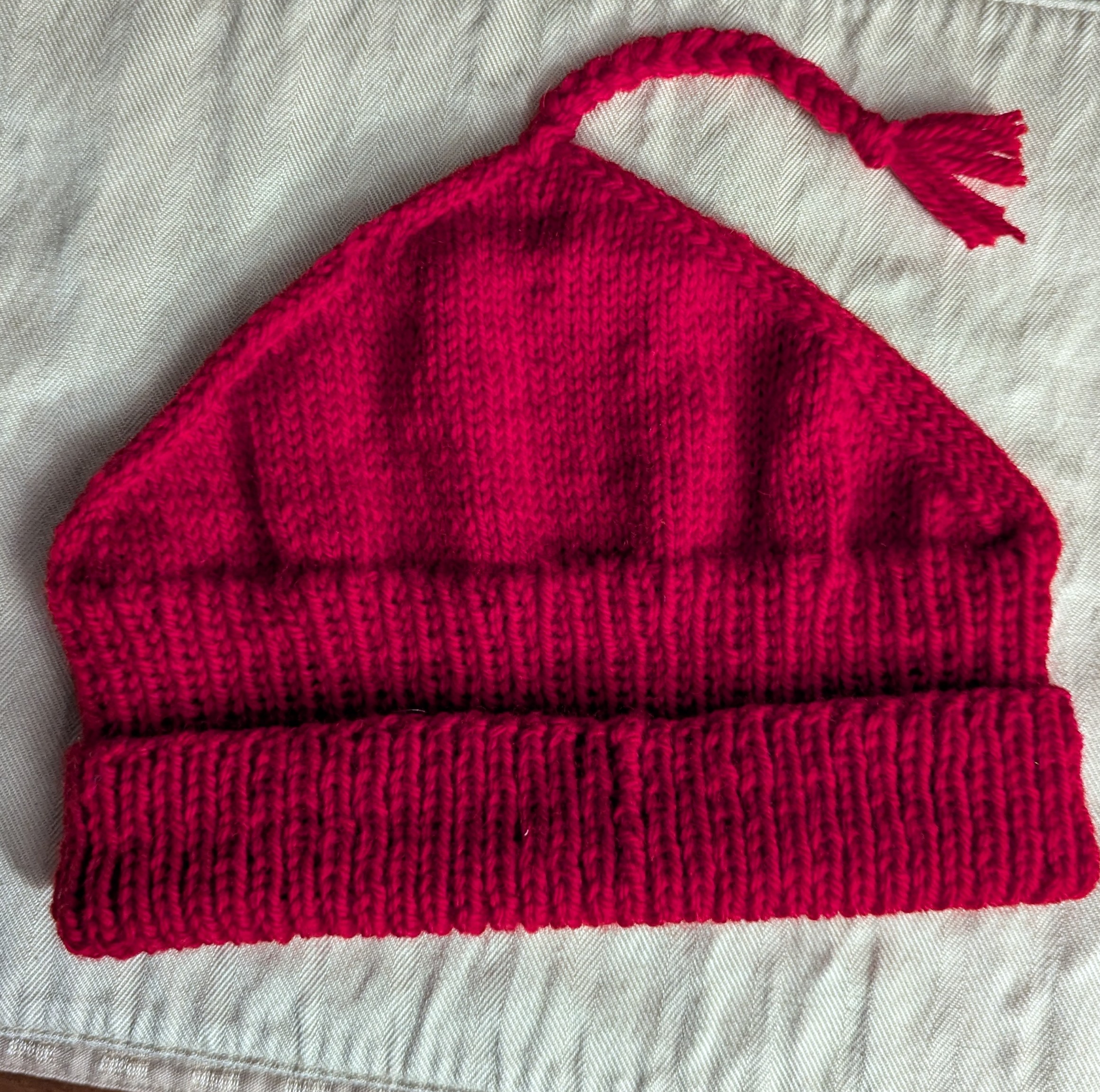 Melt the ICE Red Hat: When Knitting Speaks – Common Threads